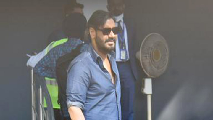 Ajay Devgn looks dashing in a blue shirt as he poses for paps ...