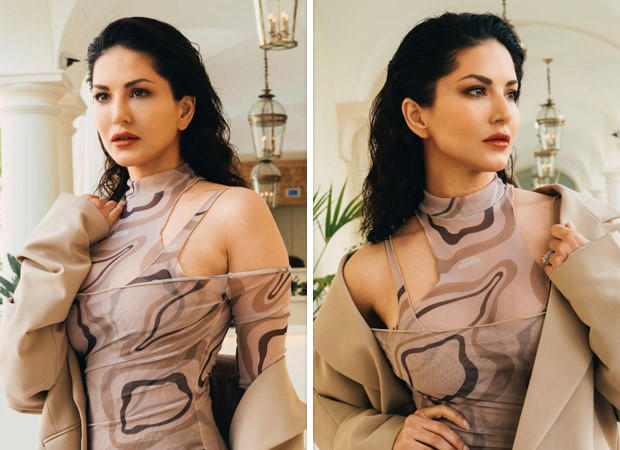 Cannes 2023: Sunny Leone mesmerizes in a sheer brown cut-out midi dress, accompanied by a chic ...