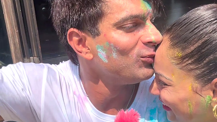 Adorable! Devi is all excited about celebrating Holi with mom & dad ...