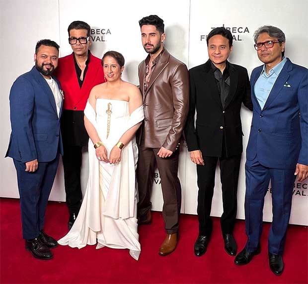 Karan Johar, Lakshya, Guneet Monga and team Kill strike a pose during the premiere at Tribeca ...